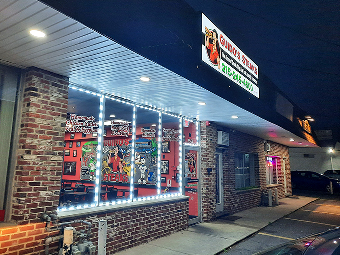 At night, Guido's glows like a beacon for the hungry, its illuminated windows promising comfort food salvation to weary travelers.