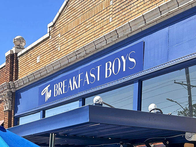 The bright blue awning of The Breakfast Boys stands out like a culinary beacon, promising morning delights that'll make hitting the snooze button your biggest regret.