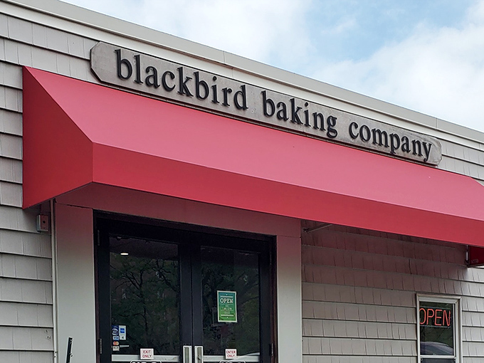 The iconic red awning of Blackbird Baking Co. beckons like a culinary lighthouse on Lakewood's shoreline of suburban storefronts.