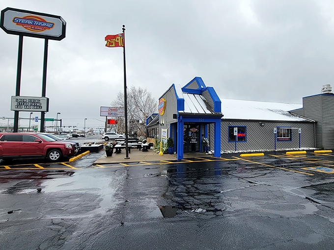 The distinctive blue trim of Steak Thyme Bar & Grill stands out even on a gray Dayton day, like a beacon calling hungry travelers home.