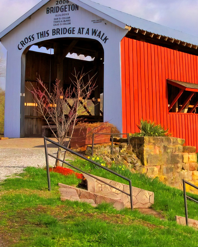 The iconic white and red Bridgeton Bridge welcomes visitors with its charming "Cross This Bridge At A Walk" instruction&mdash;advice worth heeding to savor every historic step. 
