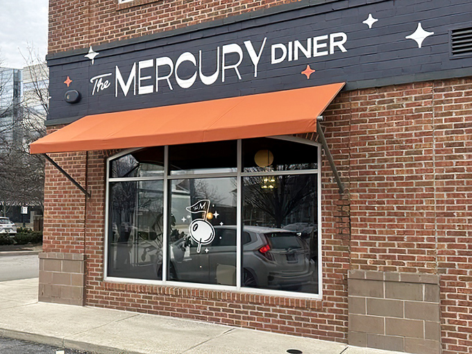 The Mercury Diner's brick fa&ccedil;ade and orange awning beckon like a retro-futuristic beacon on Columbus' High Street. Space-age dining, earthly delights await.