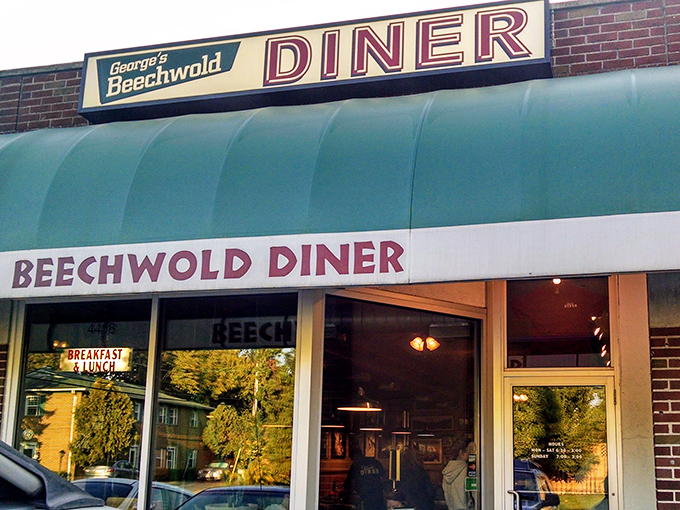 The iconic turquoise awning of Beechwold Diner beckons like a beacon of breakfast hope on Indianola Avenue. No fancy frills, just honest food awaiting inside.