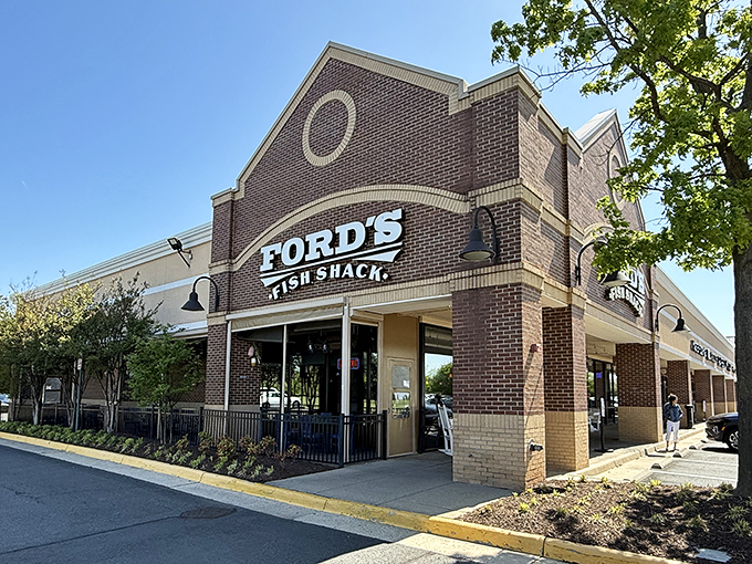 The brick facade of Ford's Fish Shack stands proudly in Ashburn, a siren call to seafood lovers stranded in suburban Virginia's landlocked expanse.