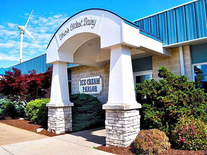 The iconic blue and white facade of Toft's proudly declares its heritage as "Ohio's Oldest Dairy," standing like a temple to frozen delights.