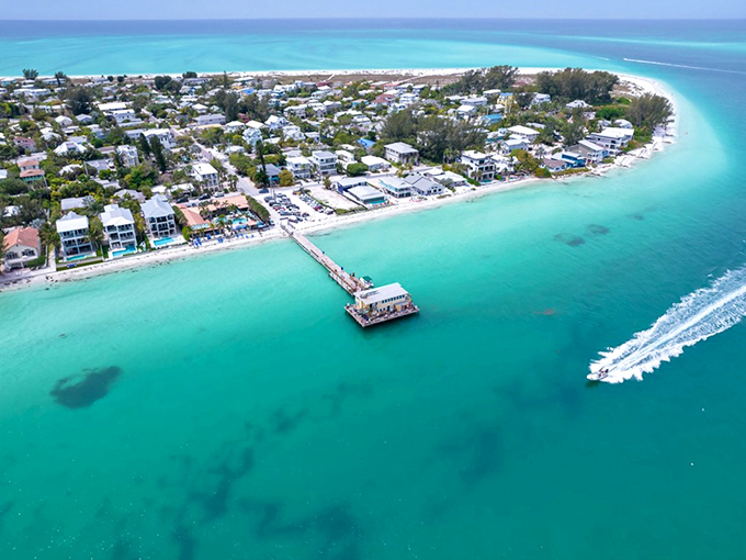 Aerial paradise where turquoise waters embrace shoreline homes. This isn't a Caribbean postcard&mdash;it's Anna Maria Island, Florida's best-kept retirement secret.
