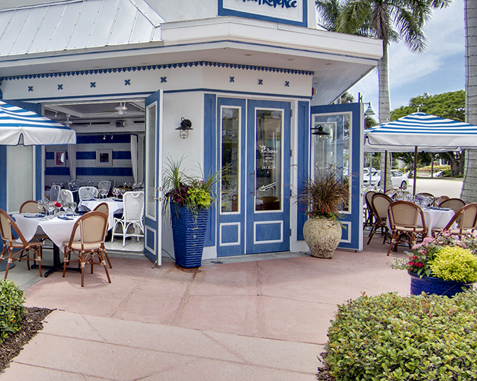 The blue and white fa&ccedil;ade of Bleu Provence isn't just Instagram-worthy&mdash;it's your first clue that culinary magic awaits inside this Naples gem.