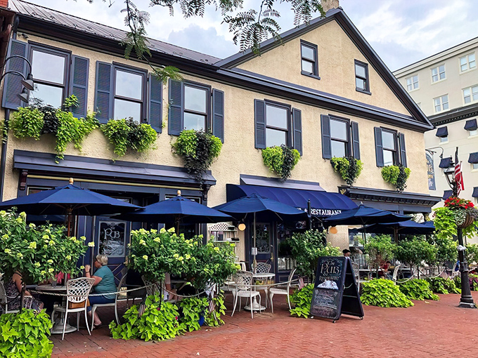 The stately yellow exterior with cascading greenery and navy awnings invites you in like a charming European caf&eacute; that happened to settle in historic Gettysburg.