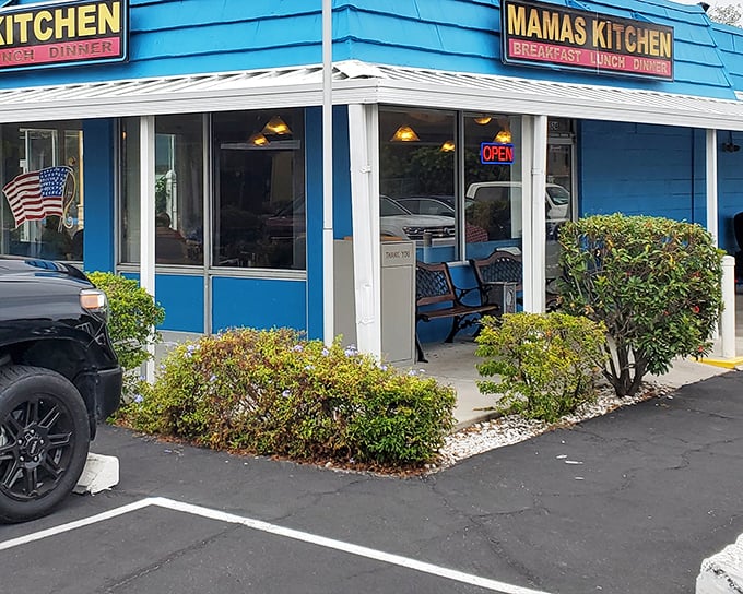 The bright blue exterior of Mama's Kitchen stands out like a beacon for breakfast lovers on Dale Mabry Highway, promising homestyle comfort within.