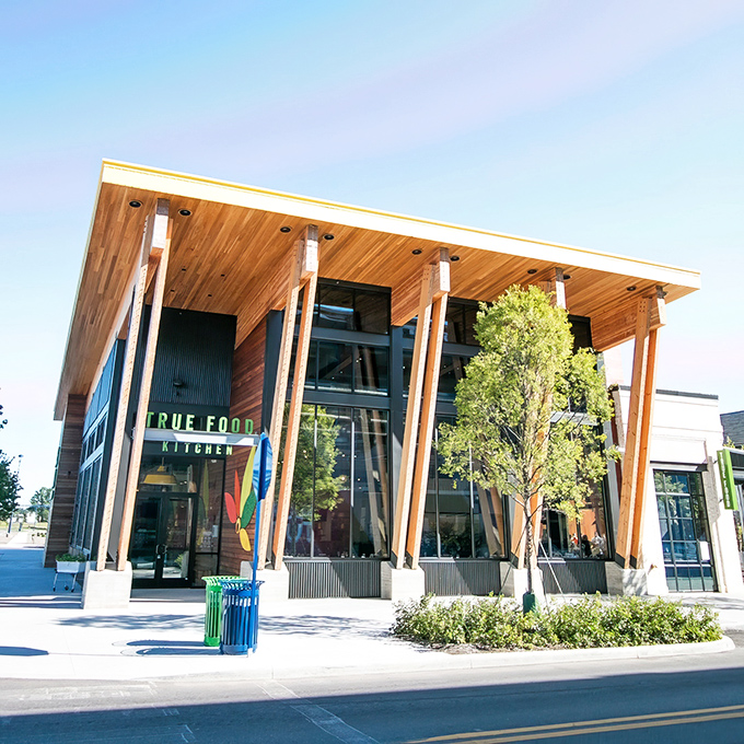 True Food Kitchen's wooden fa&ccedil;ade brings warmth to modern dining. The sleek signage promises what's inside: honest food that doesn't sacrifice flavor for health.