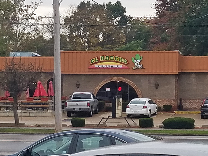 El Rancho's sunset-kissed patio beckons with colorful umbrellas and lush greenery &ndash; like a Mexican vacation without the passport requirement.