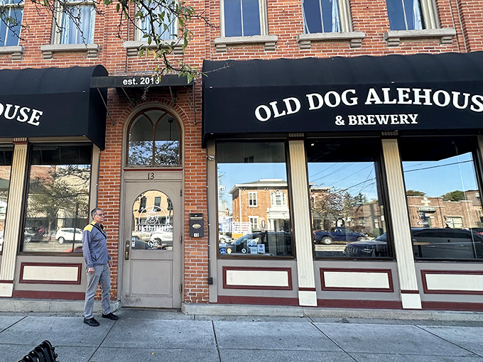 The brick facade of Old Dog Alehouse & Brewery stands like a culinary lighthouse in downtown Delaware, beckoning hungry travelers with promises of craft beer and comfort food.