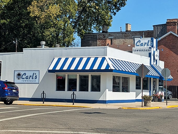 The blue and white striped awning of Carl's Townhouse isn't just eye-catching&mdash;it's a beacon of breakfast hope on Chillicothe's streets. Classic Americana at its finest.