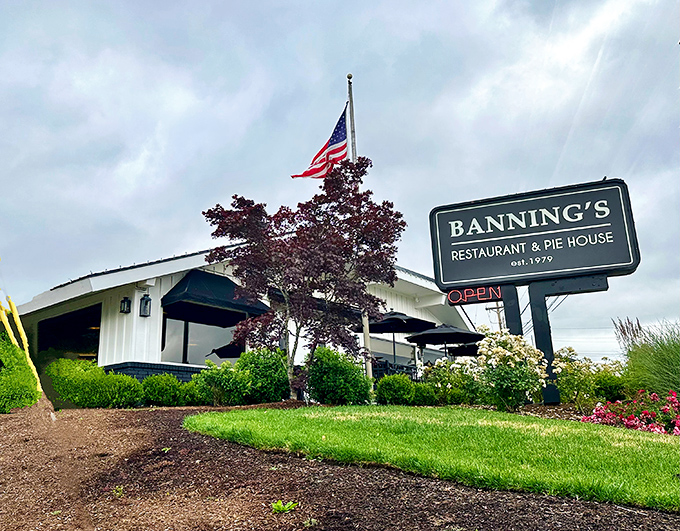 Banning's classic white exterior stands proudly under Oregon skies, the American flag waving as if to signal "comfort food served here!"