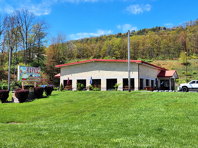Nestled against Pennsylvania's rolling hills, Kavkaz's distinctive red-roofed building promises culinary adventures far beyond its unassuming exterior.