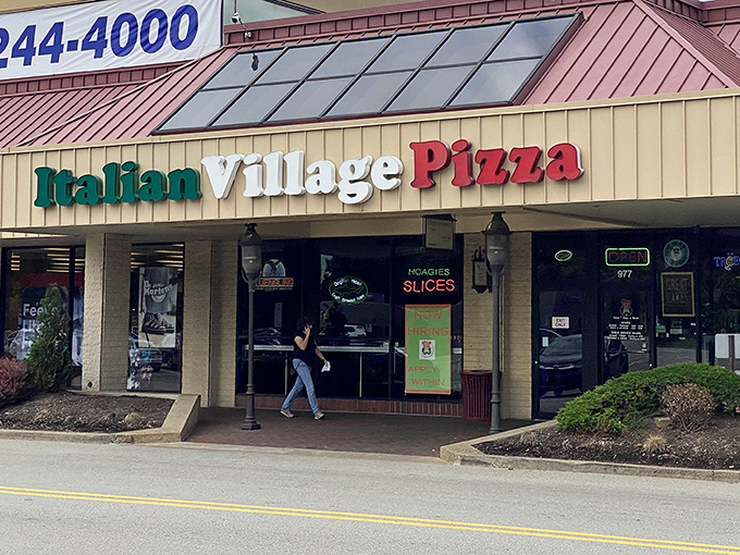 The red, white, and green signage isn't subtle, but neither is the promise of authentic Italian flavors waiting inside this Pittsburgh strip mall gem.