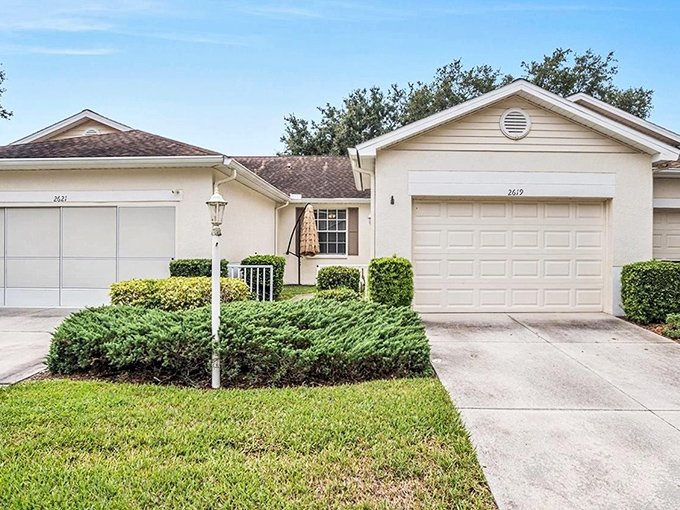 Well-maintained villas at Kings Point offer single-story living with manicured landscaping&mdash;Florida retirement without breaking the bank.