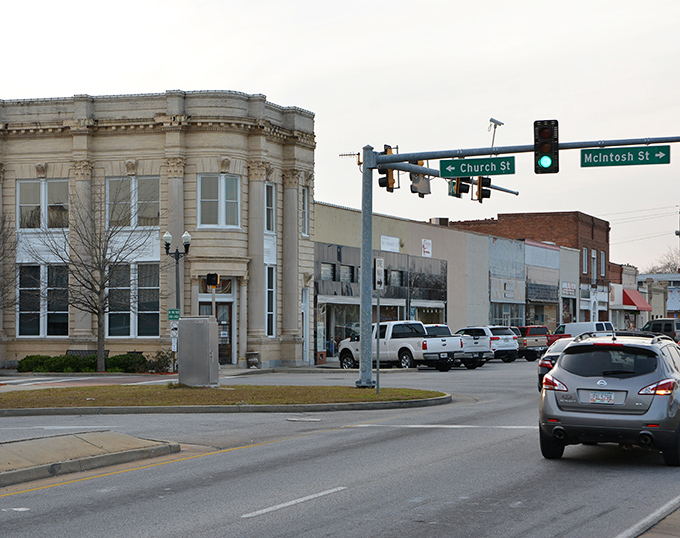 The intersection of Church and McIntosh Streets anchors downtown Vidalia, where this stately corner building stands as a testament to small-town architectural grandeur.