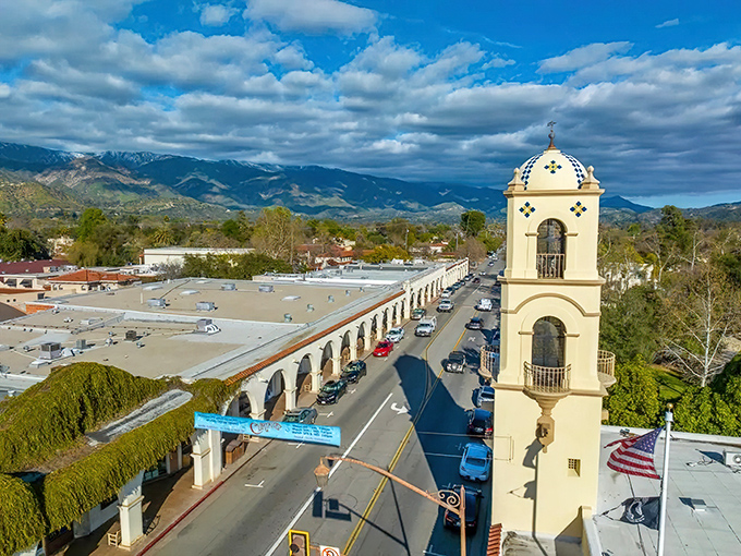 From above, Ojai reveals its perfect valley setting, with the distinctive arcade and bell tower framed by mountains that cradle this peaceful haven.