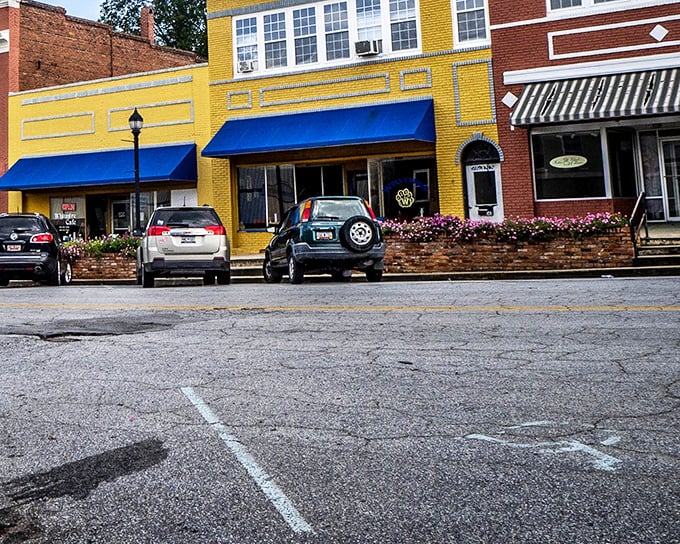 Whitmire's vibrant yellow storefronts with bright blue awnings feel like stepping into a Wes Anderson film set in small-town America.