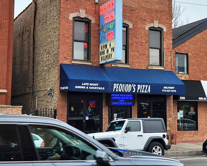 The unassuming blue awning of Pequod's Pizza stands like a beacon of hope on a Chicago street. Pizza pilgrims know: the best treasures often hide in plain sight.