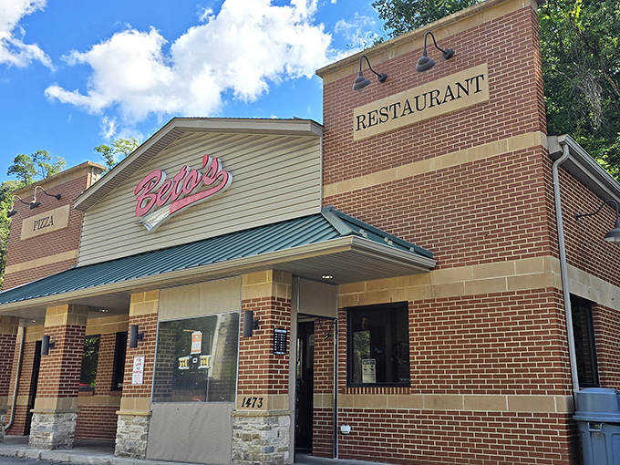 The brick-and-mortar home of pizza rebellion, where Beto's iconic neon sign has been beckoning Pittsburgh pizza pilgrims for decades.