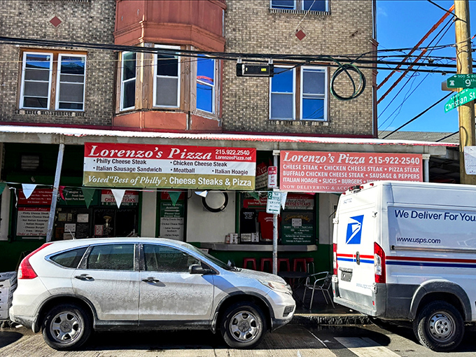 The green storefront at 9th and Christian stands like a beacon of hope for the hungry. Philadelphia's pizza paradise awaits!