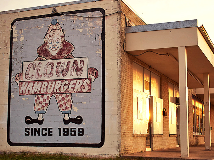 That weathered clown sign isn't just advertising &ndash; it's a beacon calling burger lovers home.