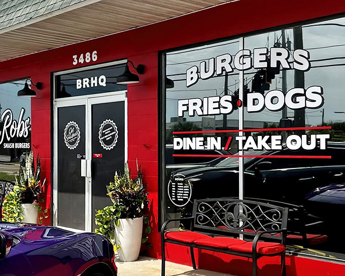 The bright red exterior of BurgerRobs stands out like a culinary lighthouse, beckoning hungry travelers with promises of smash burger perfection.
