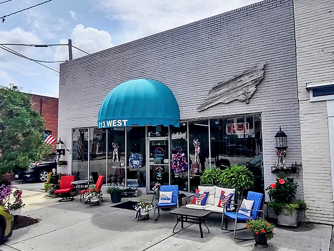 The unassuming storefront with its teal awning and inviting outdoor seating is the culinary equivalent of a secret handshake among North Carolina food lovers.