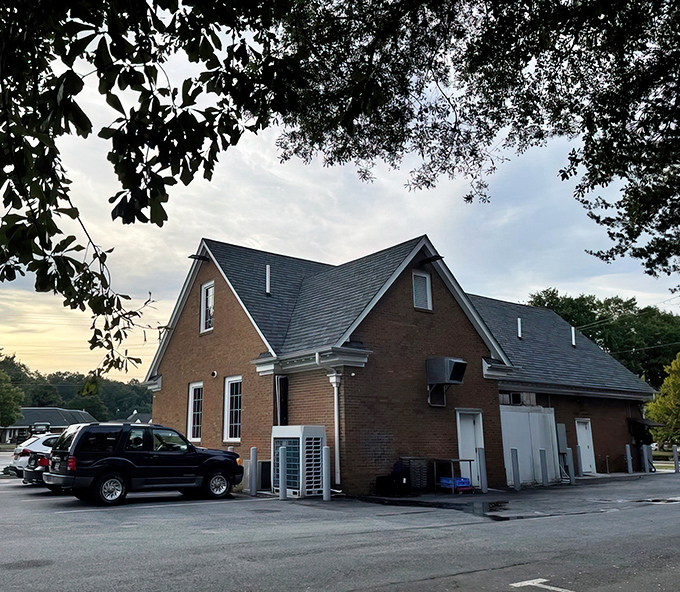 Who knew burger paradise was hiding in this unassuming brick building? NFA Burger's modest exterior belies the culinary treasures waiting inside.