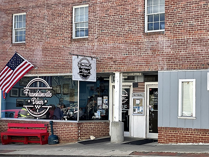 The classic brick exterior and vintage sign promise exactly what you want from a diner: no pretense, just "Best Food in Town" honesty.