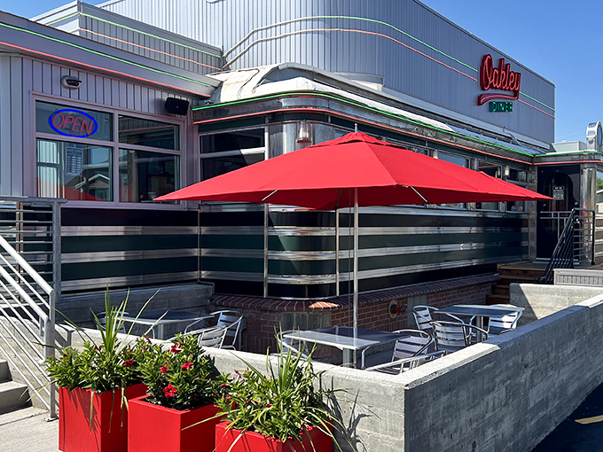 The gleaming chrome exterior of Oakley Diner beckons with its outdoor patio&mdash;perfect for savoring that legendary Reuben sandwich amid Utah's mountain scenery.