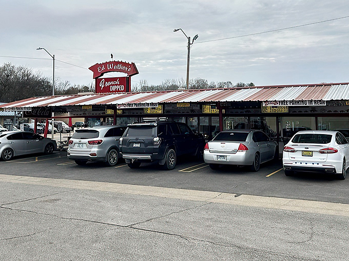 The classic red-and-white exterior of Ed Walker's beckons like a time portal to simpler days when carhop service was king, with a parking lot full of cars waiting for their turn.