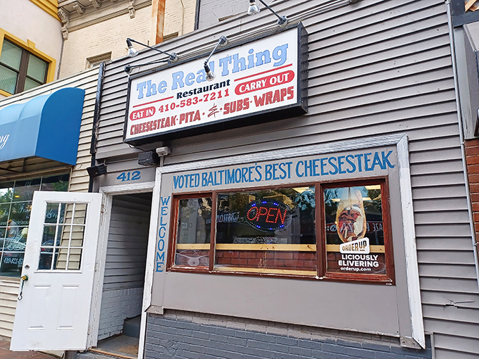 The modest storefront boldly proclaims its champion status. Like finding a Grammy winner performing in your neighbor's garage&mdash;unassuming yet extraordinary.