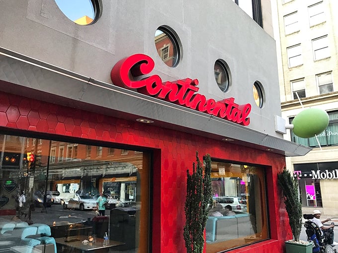 The Continental Midtown's bold red façade and distinctive porthole windows make it look like a retro spaceship landed in downtown Philadelphia.