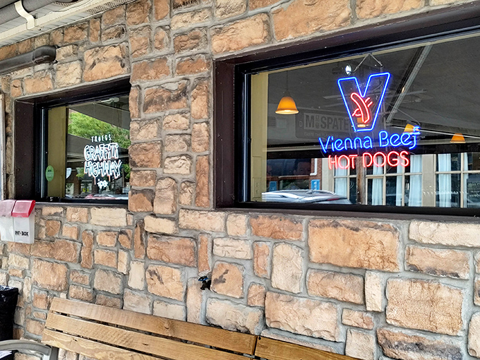 The stone facade and glowing Vienna Beef sign promise comfort food nirvana. Like finding a secret clubhouse that happens to serve incredible cheesesteaks.