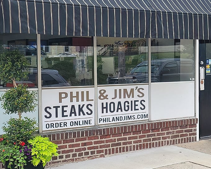 The unassuming storefront that houses sandwich greatness. Classic striped awning, brick facade, and zero pretension&mdash;just the way a legendary hoagie shop should be.