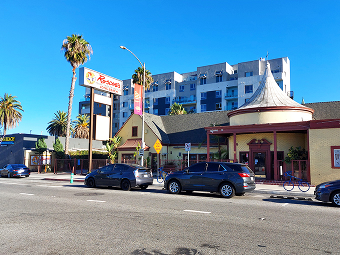Roscoe&rsquo;s sign rises above Long Beach, a legendary landmark where chicken and waffles rule the California comfort food scene.