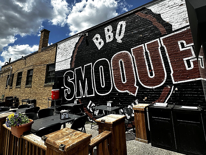 Smoque's iconic black and white exterior wall art isn't just signage&mdash;it's a beacon of hope for barbecue pilgrims seeking salvation through smoke.