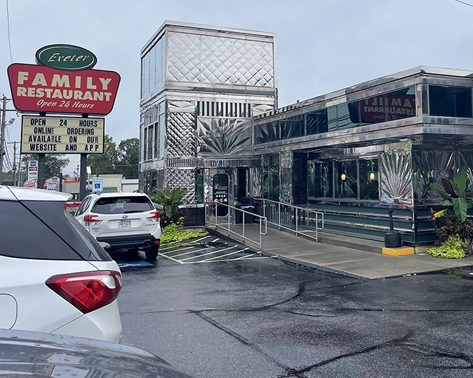 The gleaming chrome exterior of Exeter Family Restaurant shines like a beacon of hope for hungry travelers&mdash;a classic diner promising comfort in metallic splendor.