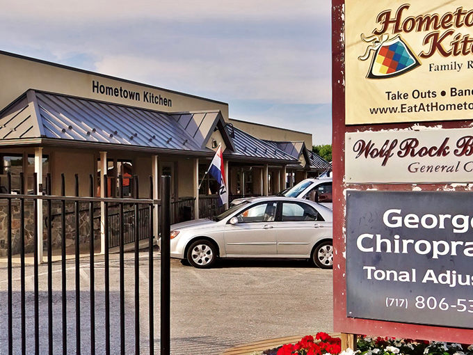 The unassuming exterior of Hometown Kitchen beckons like an old friend, promising comfort food treasures within its humble walls.