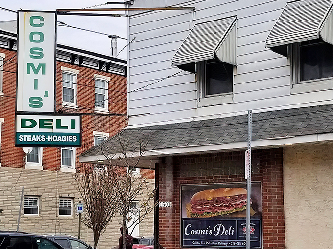 From another angle, the vintage vertical sign beckons hungry pilgrims like a lighthouse for the sandwich-starved. No flash, all substance—the Philadelphia way.