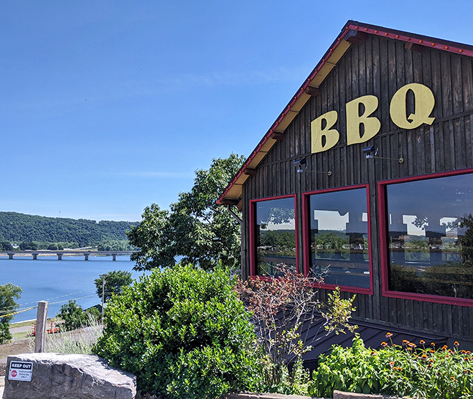 Rustic charm meets serious BBQ business at Skeeter's exterior, where that red-trimmed wooden structure promises smoky delights within.