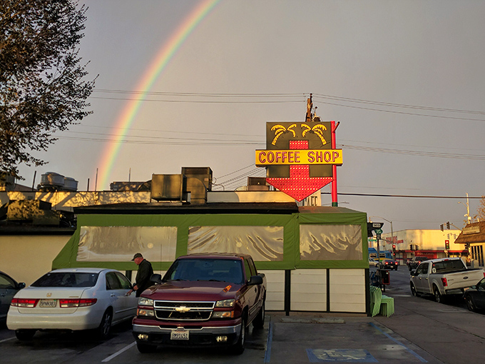 That vintage neon sign isn't just advertising—it's practically issuing a breakfast invitation you can't refuse.