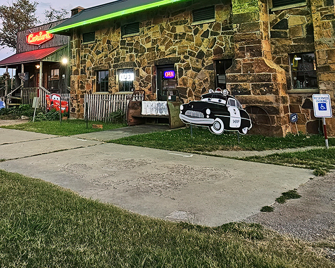The iconic stone exterior of Rock Cafe stands as proudly as it has since 1939, with Route 66 character oozing from every carefully placed rock.