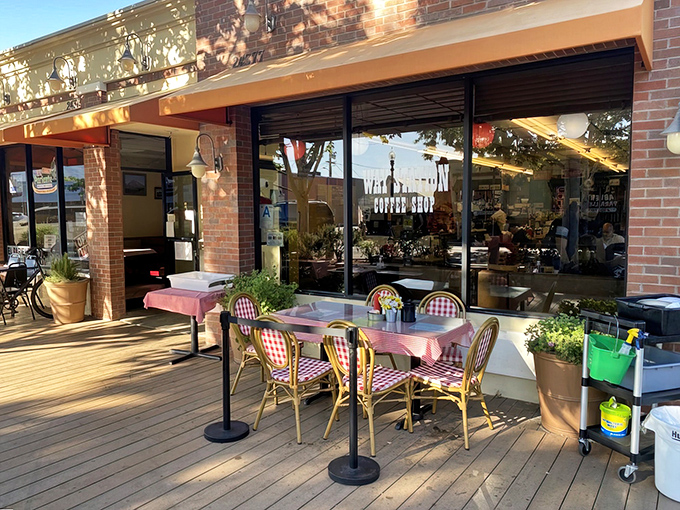 The brick exterior of Way Station Coffee Shop beckons like an old friend, complete with those charming red-checkered tablecloths that practically whisper, "Sit down, stay awhile."