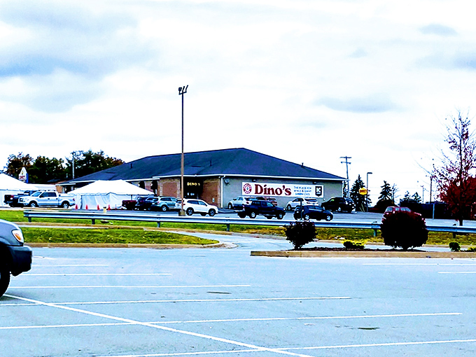 The unassuming exterior of Dino's Sports Lounge stands like a temple of wing worship in Latrobe, where flavor trumps flash every time.