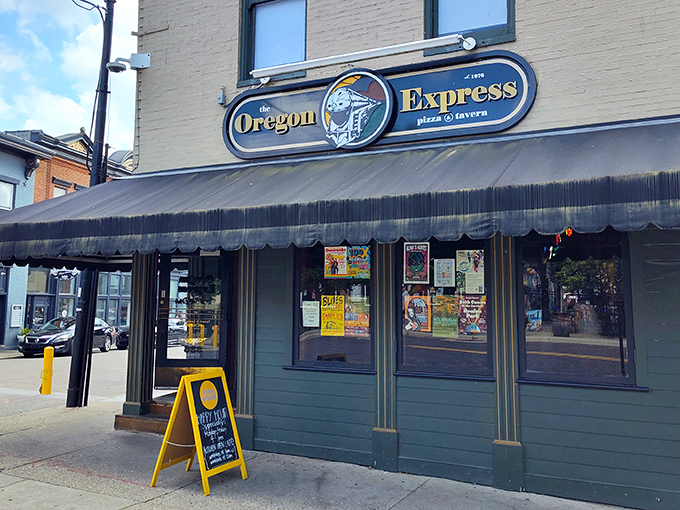 The unassuming exterior of Oregon Express hides culinary treasures within. That vintage sign promises pizza adventures that locals have treasured for years.
