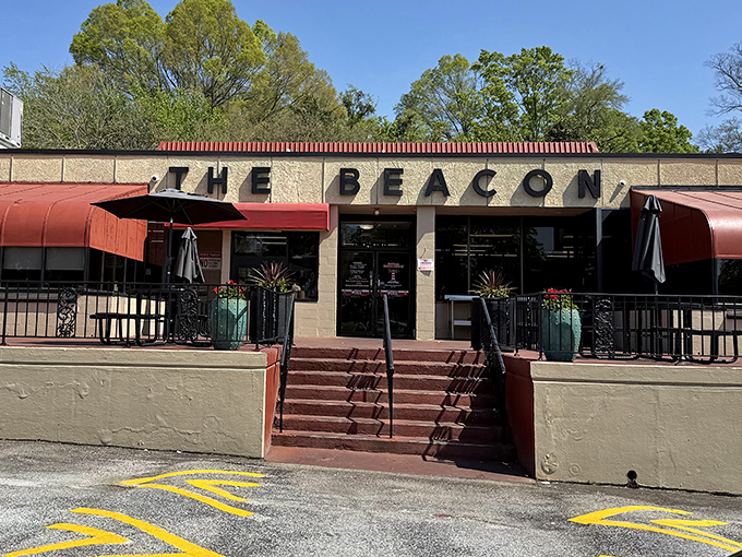 The iconic red awnings of The Beacon beckon hungry travelers like a lighthouse for the famished. Southern comfort food awaits inside.